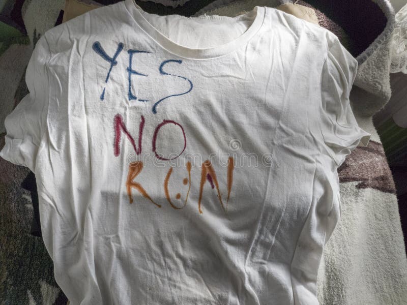 Writing Yes, No and Run on T-Shirt with Ink Stock Image - Image of ...