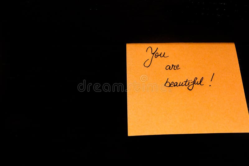 Writing You are Beautiful on Memo Post Reminder. Text on Sticky Paper ...