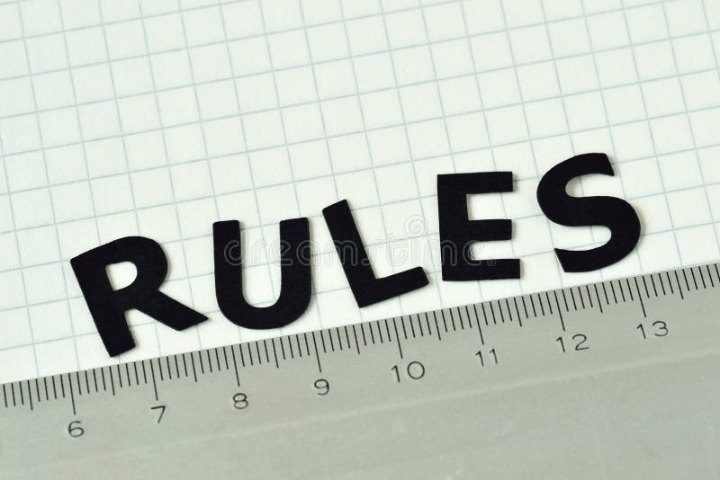 The Written Rules with Ruler on White Squared Paper - Concept of Follow ...
