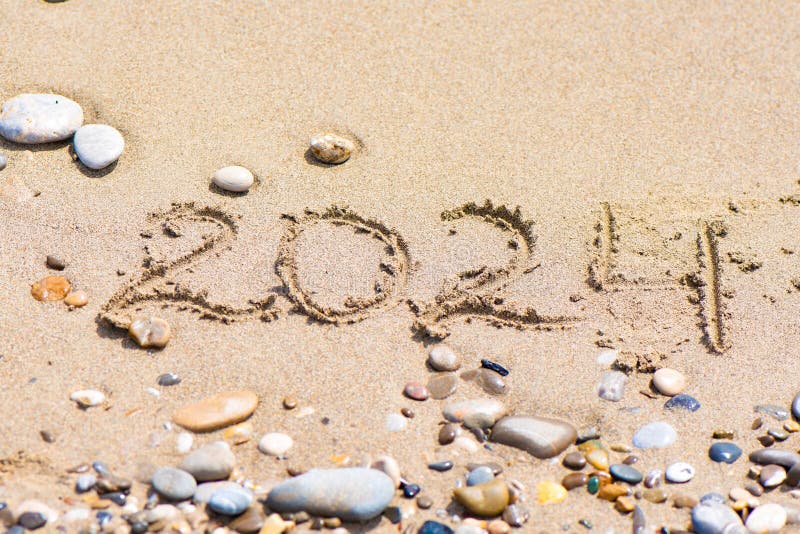 2024 Written in Sand with Pebbles. 2024 Written in Sand on a Beach with ...