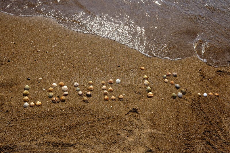 Written on the Sand with Shells Stock Photo - Image of card, love ...