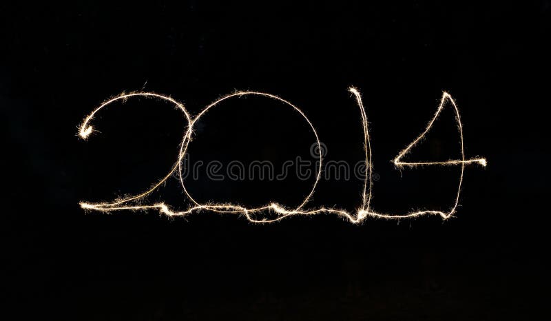 2014 Written in Sparkling Letters Stock Photo - Image of pyrotechnics ...