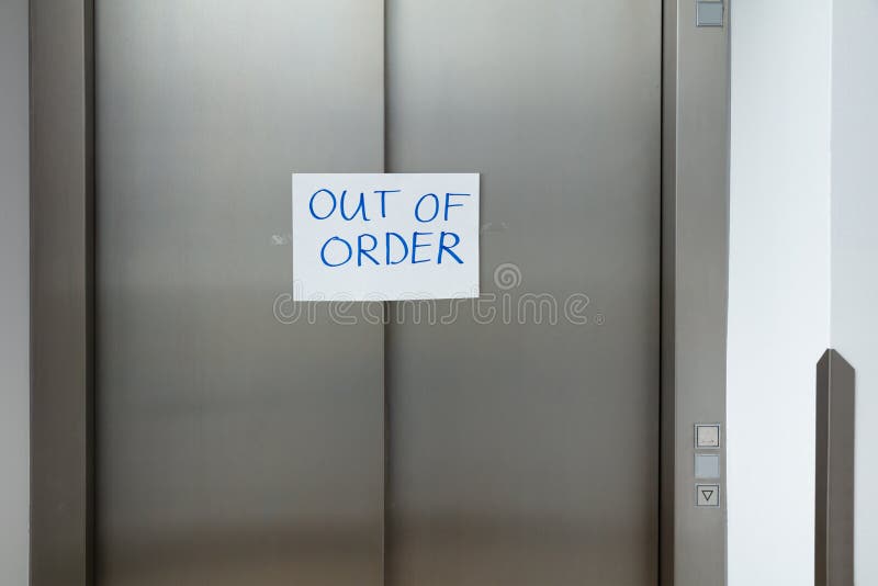 Out Of Order Elevator To Success, Please Take The Stairs Stock Photo ...