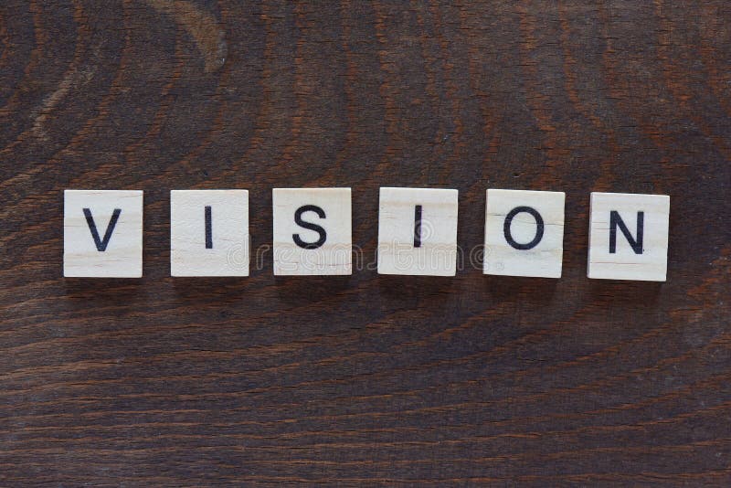 Written `VISION` with Light Wood Letters on Dark Wood Stock Image ...