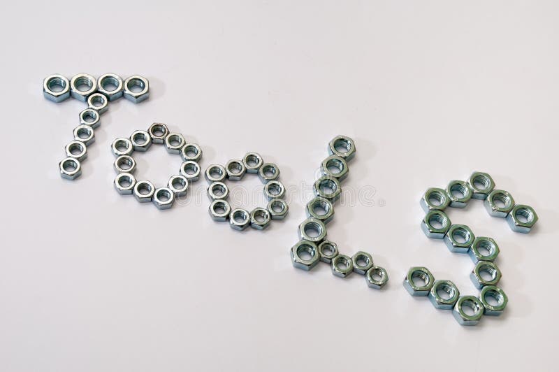 Written Word Tools with Many Metal Nuts Stock Image - Image of circle ...