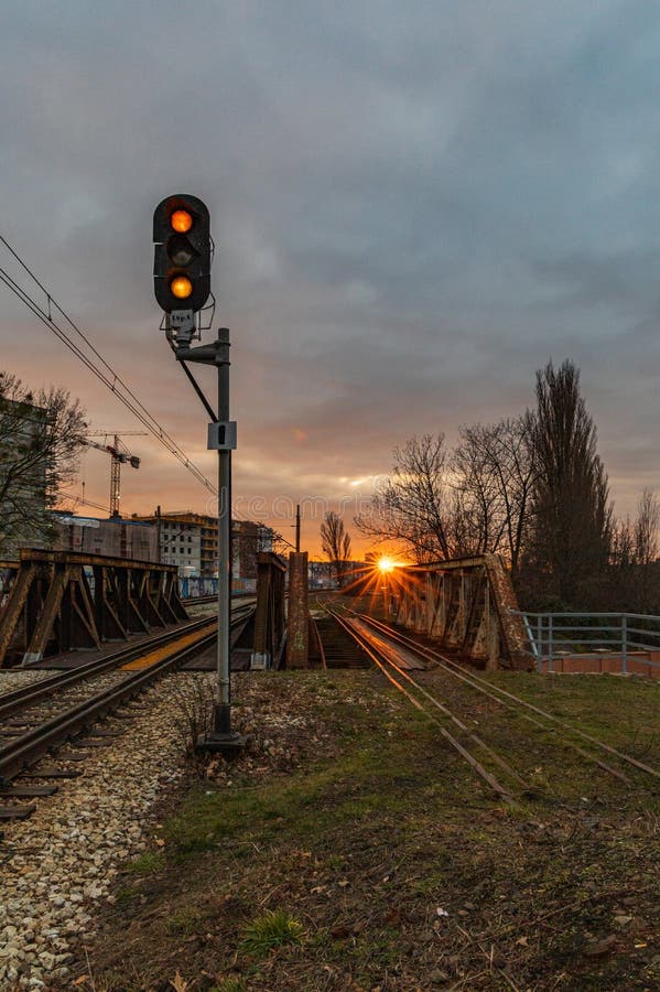 Train Traffic Light in Front of Small Railway Bridges Editorial Photo ...
