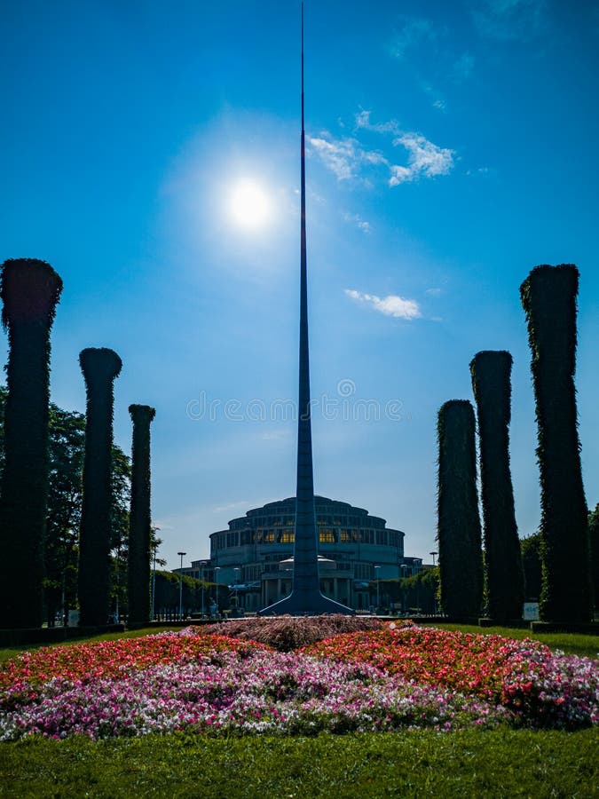 Iglica Tower with Flowers in Front of Standing in Front of Centennial ...
