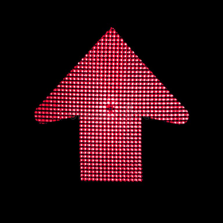 Wrong Direction. Red Arrow Light on Traffic Lights on Black Background ...