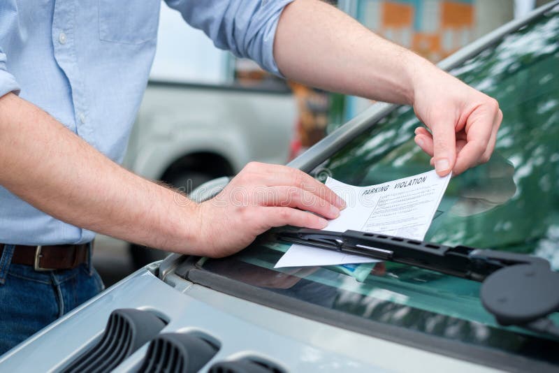 Wrong Parking Ticket Fine Placed on the Car Windshield Stock Image ...