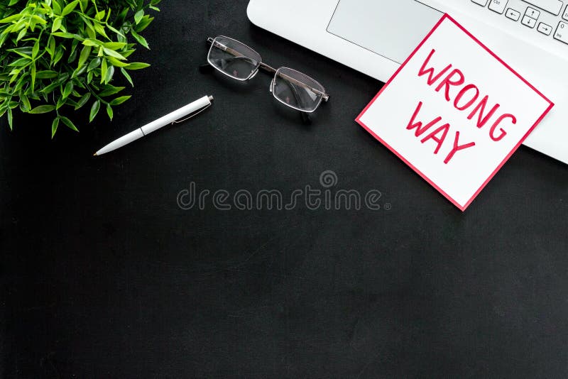 Wrong Way Icon on Office Desk - Black, Top View Copy Space Stock Photo ...