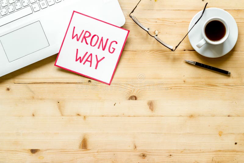 Wrong Way Icon on Office Desk - Wooden, Top View Copy Space Stock Image ...