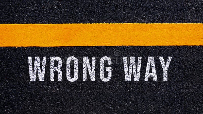 Wrong Way, Wrong Way Text Written and Yellow Line on Asphalt Road ...