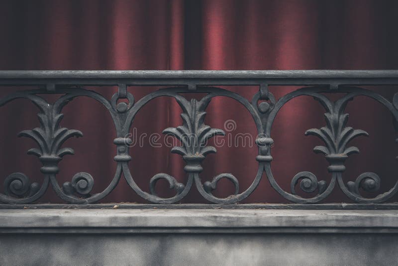 Wrought Iron Balcony Railing with Red Curtain Backdrop Stock Image ...