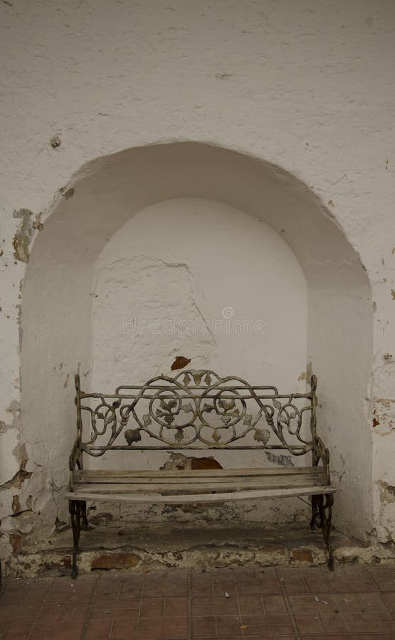 Wrought-iron Bench Stands Niche White Wall Stock Image - Image of wall ...