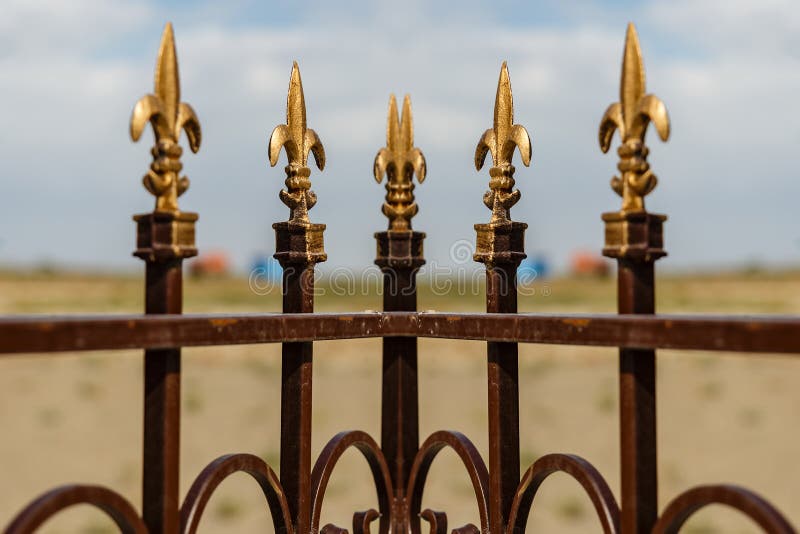 Wrought Iron Fence with Decorative Arrows Stock Image - Image of bars ...