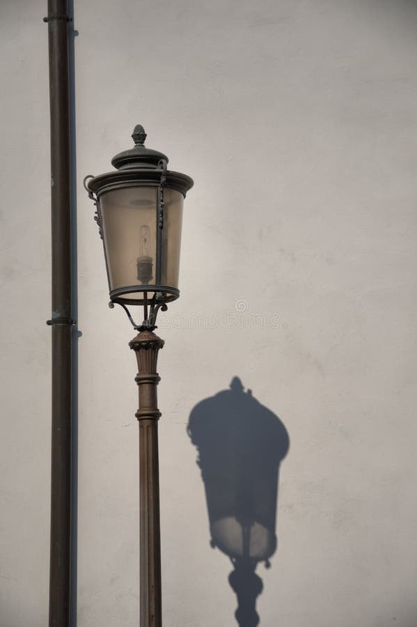 Street Lamp Shadows on Old City Facade Stock Photo - Image of detail ...