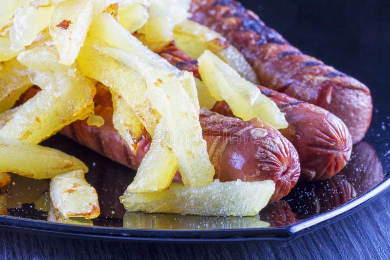 Wurstel and potatoes stock photo. Image of sauce, delicious - 74683208