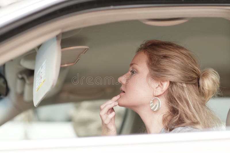 WWoman Applying Makeup in Her Car Stock Photo - Image of model, woman ...