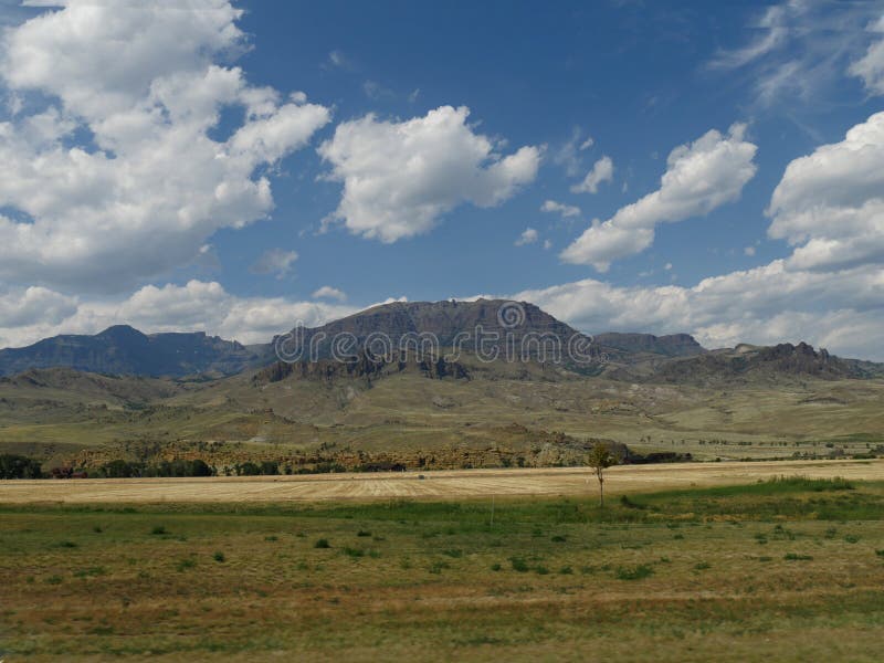 Wyoming Landscape with Distant Mountains and Rock Formations Stock ...
