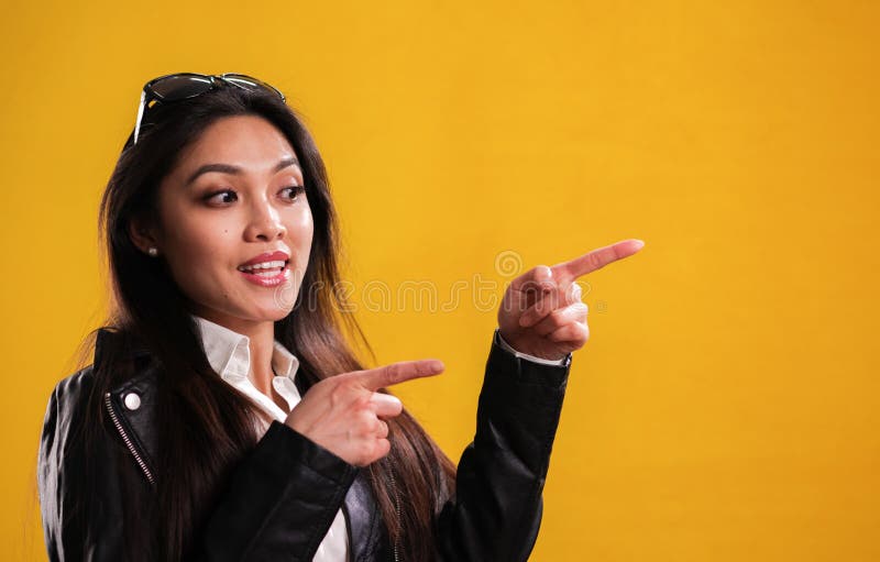 Young Happy Woman Points To Something Stock Image - Image of person ...