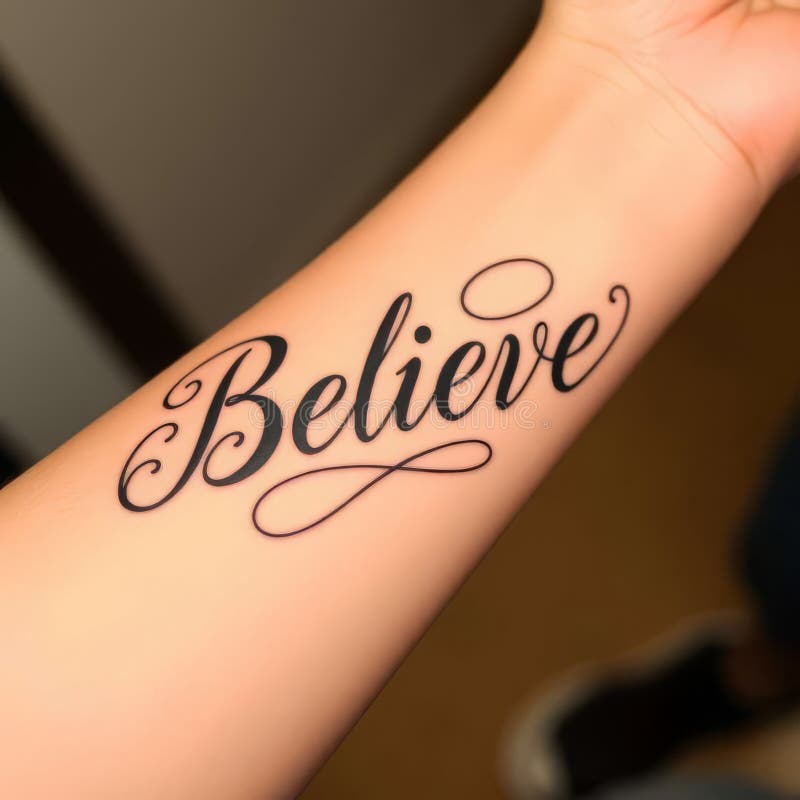 "Believe" Tattoo with Elegant Script on a Forearm Stock Image - Image ...