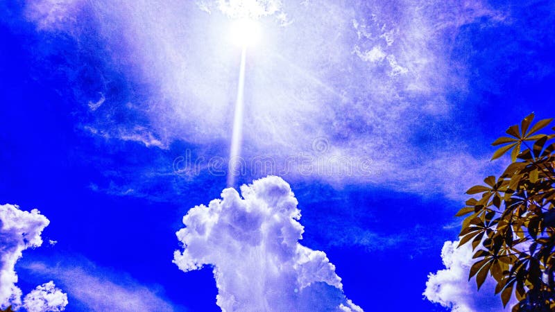"a Blue Sky with White Clouds Under the Shining Sun." Stock Image ...