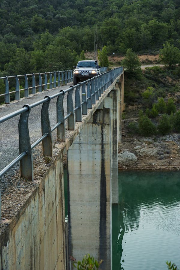 4x4 Car Crossing Dangerous Bridge in Aragon, Pyrenees, Spain Stock ...