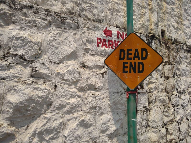 "dead End" Sign Board Against the Wall Stock Image - Image of tree ...