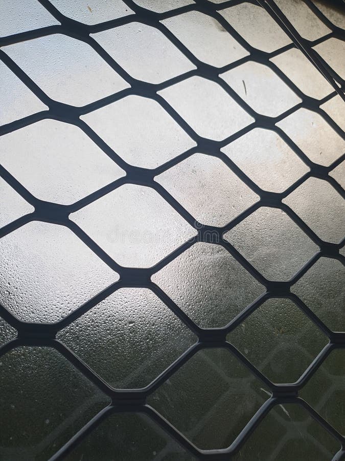 & X22;Geometric Grid Pattern on Fogged Glass Surface Stock Image ...