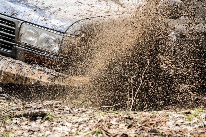 Four Wheel Drive Vehicle Splashing Through Mud Stock Image - Image of ...