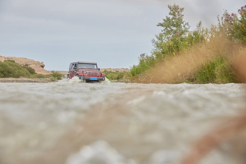 4x4 Off Road Vehicle Crossing River at Stream Stock Image - Image of ...