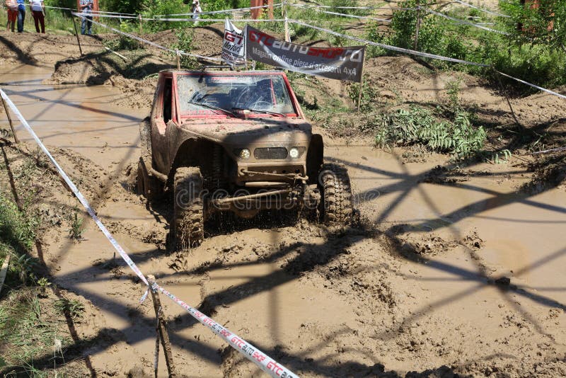 4x4 offroad vehicle in mud editorial photography. Image of trophy ...