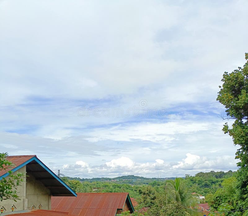 & X22;Peaceful Rural Rooftops with Scenic Horizon and Open Sky Stock ...