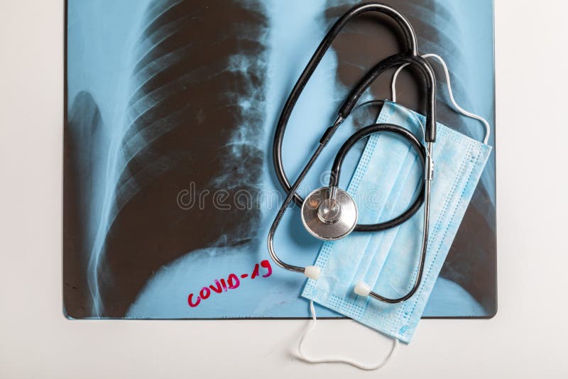 X-ray of Sick Lungs for Coronavirus, Stethoscope and Mask Stock Photo ...