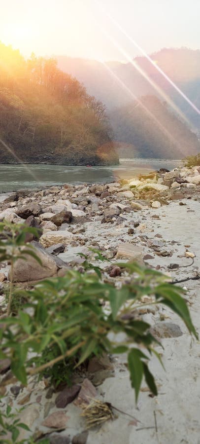 Rays of the Dawn Over the River Stock Image - Image of dawn, mountain ...