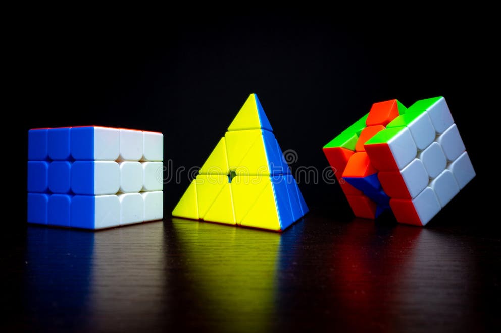 3x3 Rubik S Cube and Pyraminx Editorial Image - Image of creativity ...