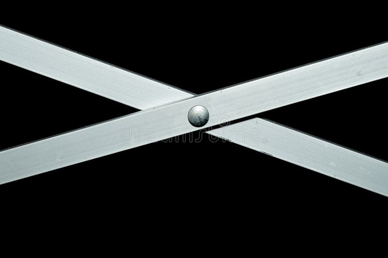 X Shaped Metal Sliding Folding Crossbar on Black Stock Photo - Image of ...