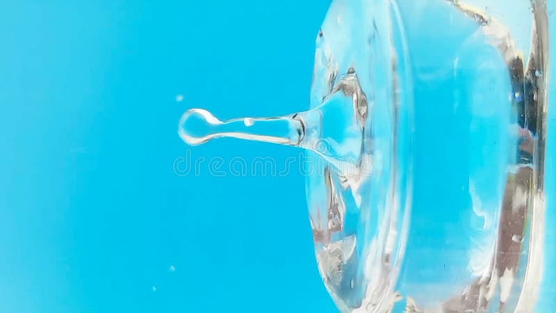 32x Slow Motion of a Water Drop Falling To a Water Surface Stock Video ...