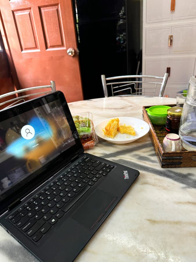 & X22;Work Setup with Snacks in the Dining Room& X22; Editorial Stock ...