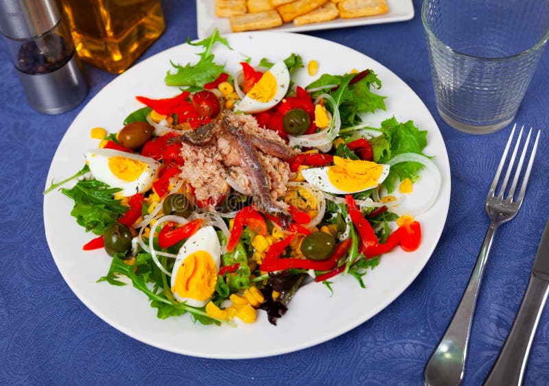 Xato Salad with Cod, Chopped Eggs and Corn Stock Photo - Image of ...