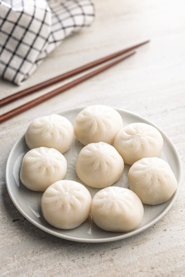 Xiao Long Bao. Chinese Dumplings on Plate on Kitchen Table Stock Image ...