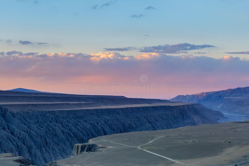 Xinjiang Canyon Scenery in Sunset Stock Image - Image of glow, geology ...