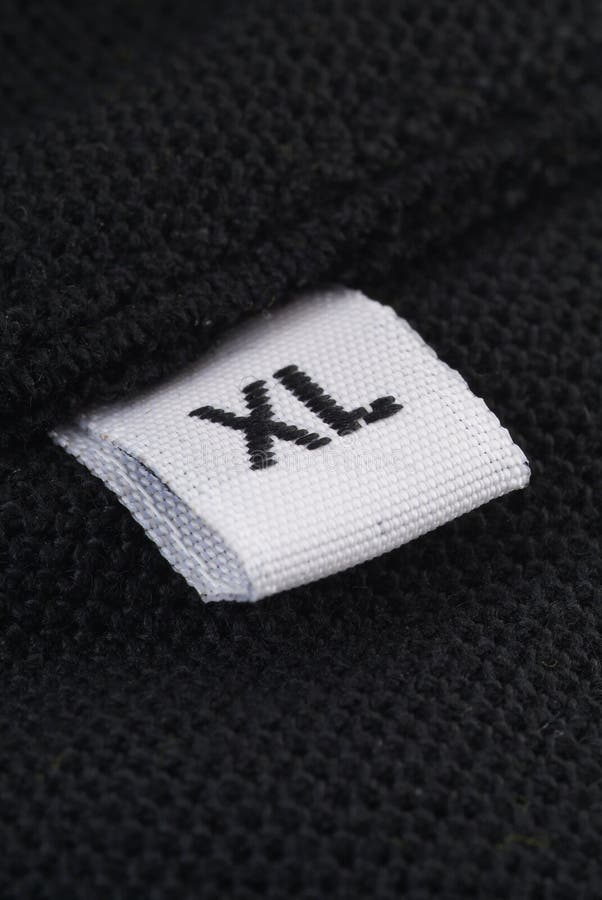 XL label stock image. Image of white, label, shirt, detail - 3245775
