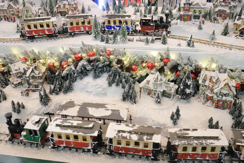 A Model Train Making Its Way Around a Christmas Tree. Stock Photo ...