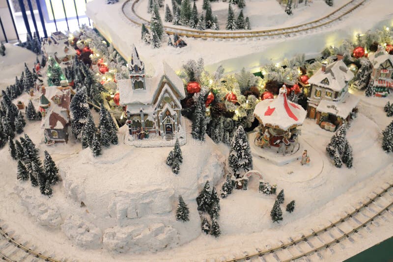 A Model Train Making Its Way Around a Christmas Tree. Stock Photo ...