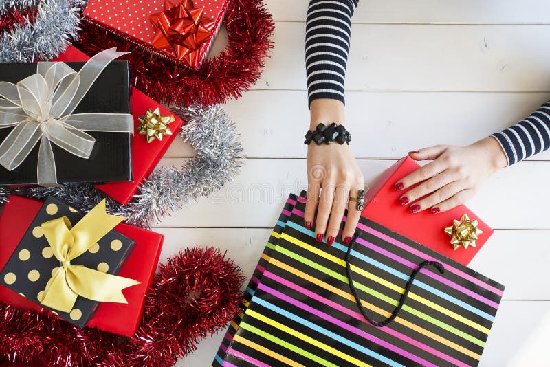 Xmas Gift Boxes on Wooden Table Stock Photo - Image of buying, present ...