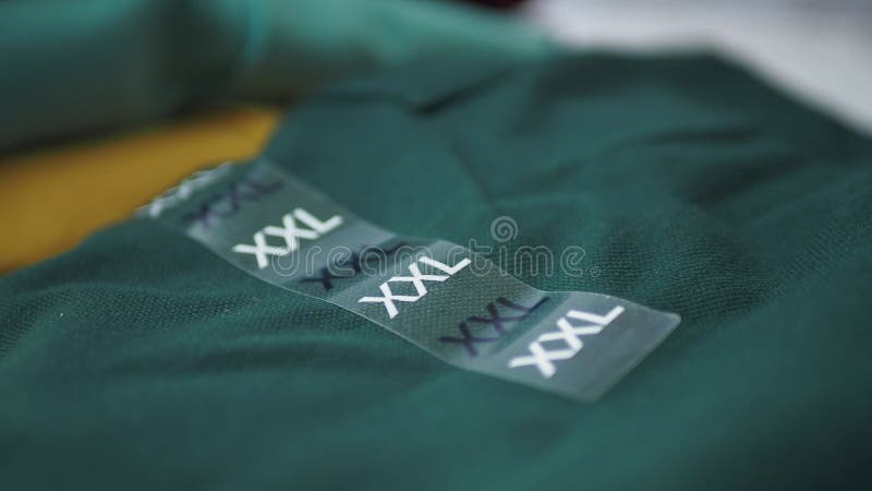 Clothing Label with Care Symbols on a Cloth Stock Footage - Video of ...