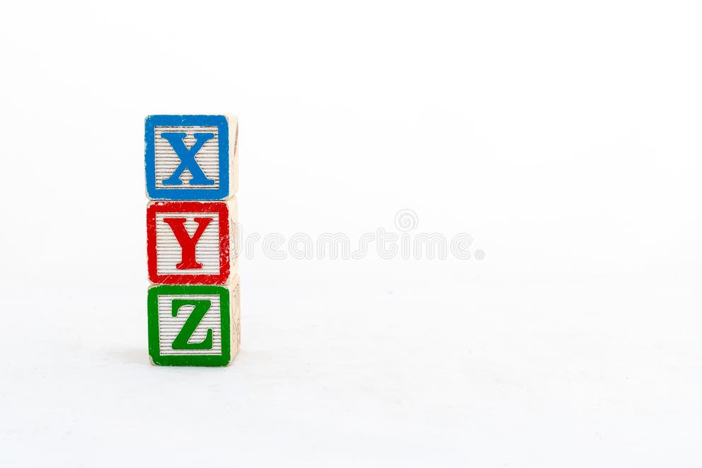 XYZ Alphabets Blocks Stacked and Isolated on White Background with Copy ...