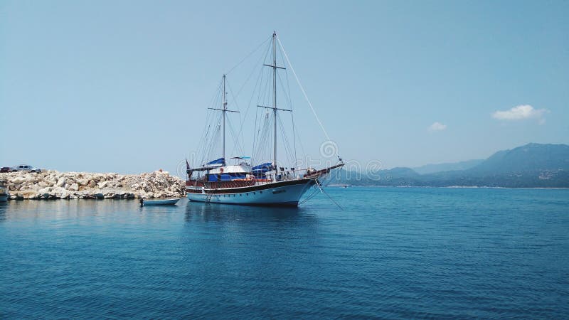 Yacht and Calm Blue Sea Off the Coast of Turkey. Stock Photo - Image of ...