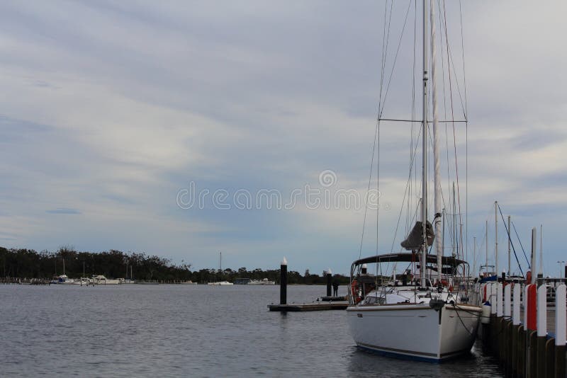 Yacht at the jetty stock photo. Image of holiday, lake - 97355074